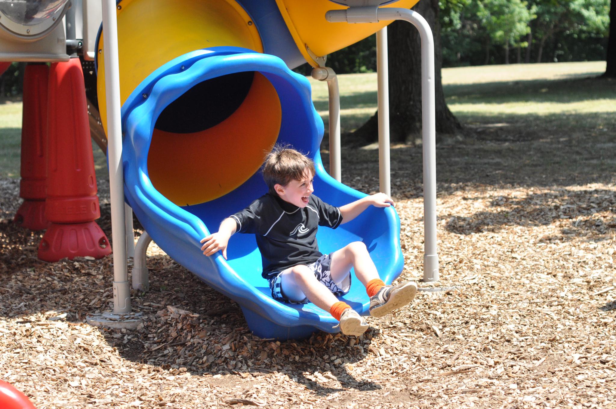 playground spaceship slide boy_2048x1360 - LakeView Day Camp